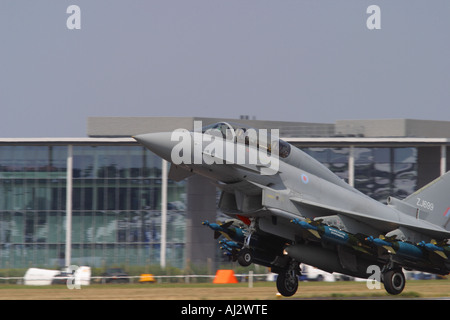 Eurofighter Typhoon plane with full weapons load displays its agility ...