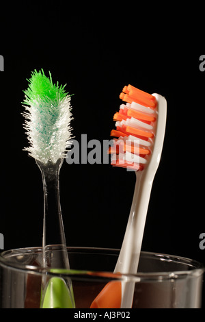 Old and new toothbrush side by side Stock Photo - Alamy