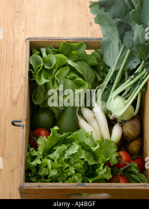 Fresh vegetables in wooden boxes on white background Stock Photo - Alamy