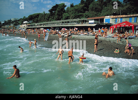 ALUSHTA, CRIMEA, UKRAINE - People on the public pebble beach near Black ...
