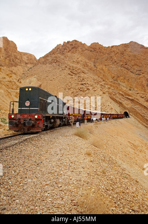 Red Lizard Train Selja Canyon, Tunisia Stock Photo - Alamy