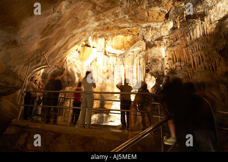 Stalagmites and stalagtites with people in Chifley Cave at Jenolan ...