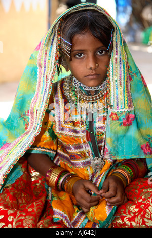 Pretty young Harijan tribal girl in mud hut in Ludia Village, nr Khavda ...