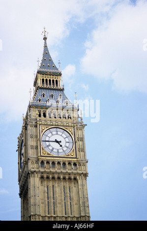 Big Ben, St. Steven's Tower, lit by the sun with jet trails in the ...