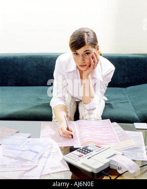 Calculator and tax papers Stock Photo - Alamy