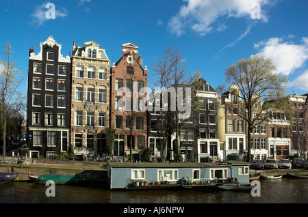 Typically Dutch narrow buildings in Amsterdam Stock Photo - Alamy