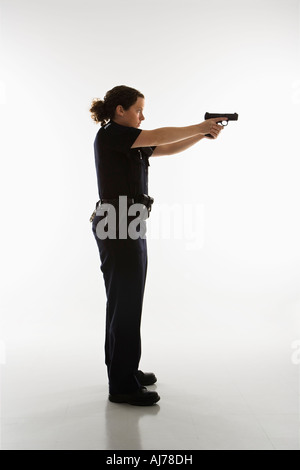 A side-view shot of a mid-adult businessman standing on a train ...