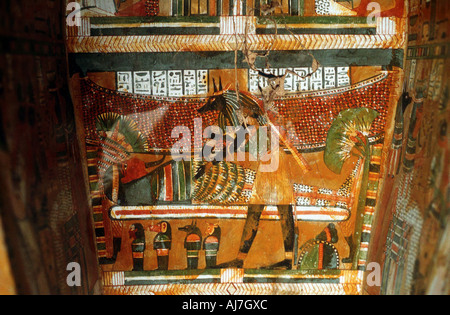 Anubis, jackal-headed god of the dead, weighs the heart of the scribe ...
