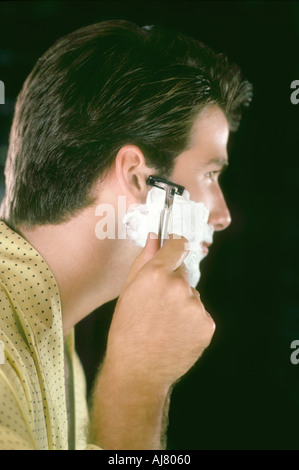 Man, razor and shaving in studio for choice, confused or thinking of ...