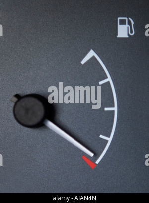 Car breakdown, out of fuel, empty tank. Female driver, is walking with ...