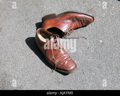 discarded shoes left on street Stock Photo - Alamy