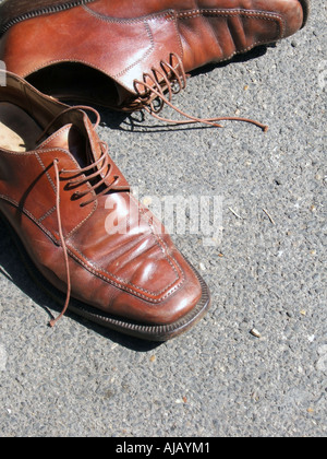 discarded shoes left on street Stock Photo - Alamy