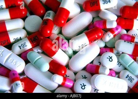 Capsules with time released medicine Stock Photo - Alamy
