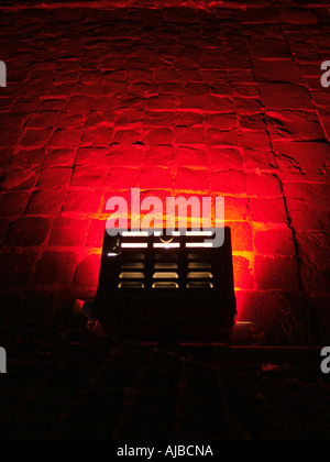 one warm orange spotlight at night Stock Photo - Alamy