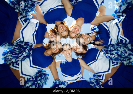 Smiling Cheerleaders standing in circle, (portrait), (view from Stock ...