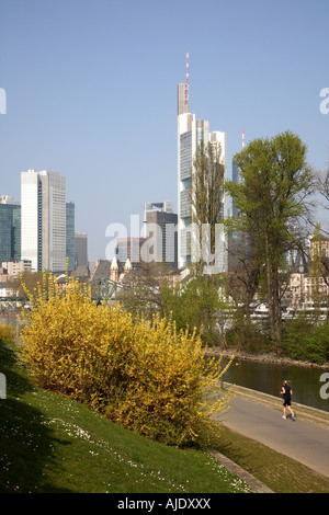 Jogger, the skyline of Frankfurt am Main, skyscrapers of the banking ...