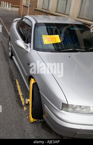 Car, wheel clamp, government agencies, untaxed, Denver Boot, yellow ...