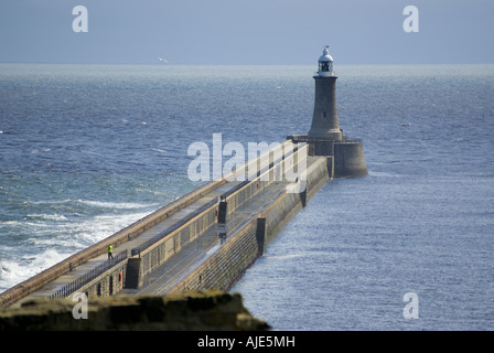 Tynemouth north pier of the harbour and it's lighthouse Stock Photo - Alamy