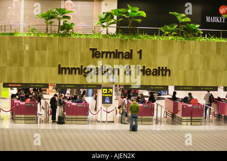 Singapore Changi airport arrival immigration counters Stock Photo - Alamy