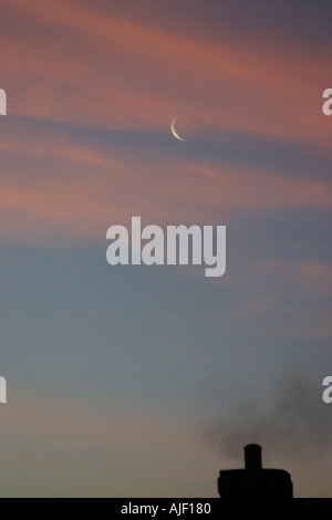 Chimney with the moon in England Stock Photo - Alamy