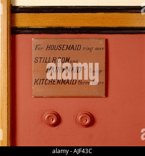 close up maid hand in the hotel ironing clothes in hotel room on white ...