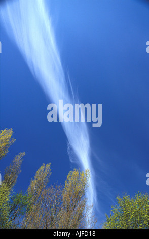 Streaky cloud in blue sky over rural landscape, Taranaki, North Island ...
