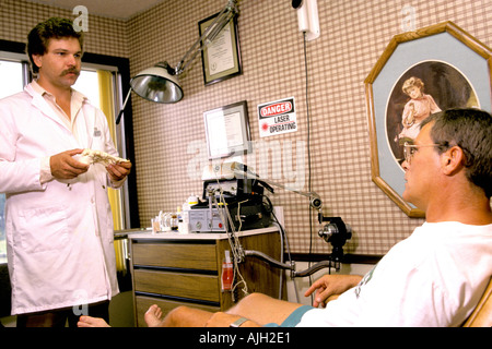 Podiatrist foot doctor checks the feet of a female patient Stock Photo ...