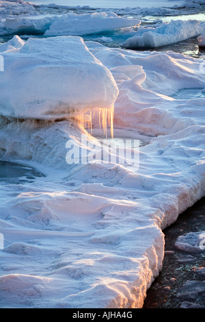 Icicles in an iceberg floating in the Arctic Ocean, by the north coast ...