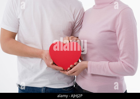 Man and woman holding gift box. Celebrate a happy new year Stock Photo ...