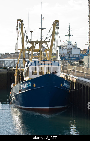 Fishing vessel entering Port low water Shoreham Docks Sussex Stock ...