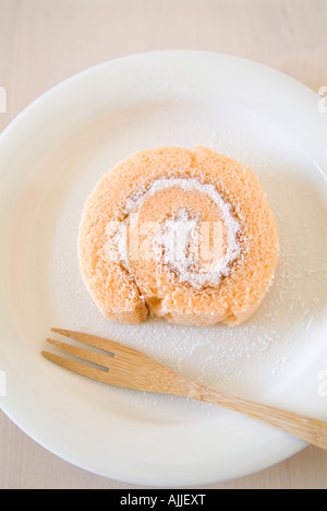 Plate of Swiss Sponge Roll Stock Photo - Alamy