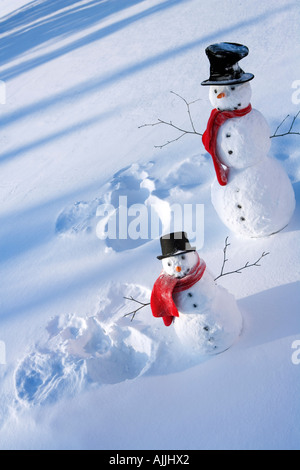 Two Snowmen and Snow Angel Alaska Winter Stock Photo - Alamy