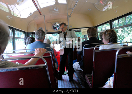 Conductor on a restored 1959 Leyland Tiger Cub King Alfred bus ...