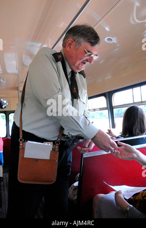 Conductor on a restored 1959 Leyland Tiger Cub King Alfred bus ...