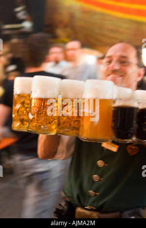 Serving beer at the Stuttgart Beer Festival, Cannstatter Wasen ...