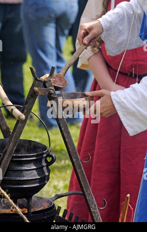 Entertainer dressed as a Medieval Serving wench taking part in a feast ...