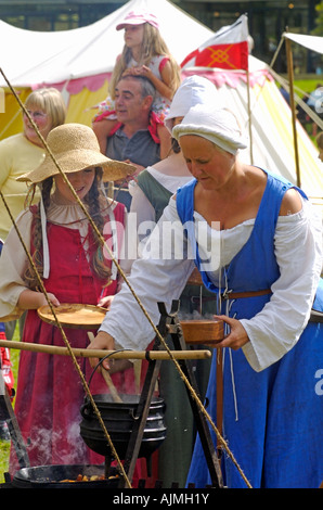 Entertainer dressed as a Medieval Serving wench taking part in a feast ...