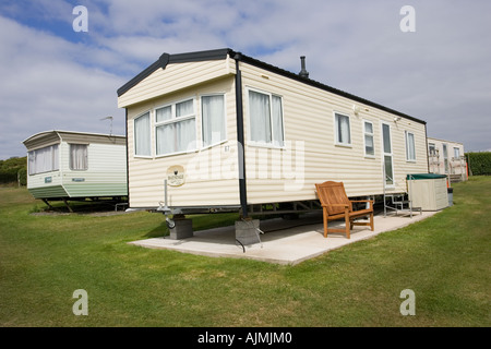 Modern static mobile home holiday caravans on attractive site at Stock ...