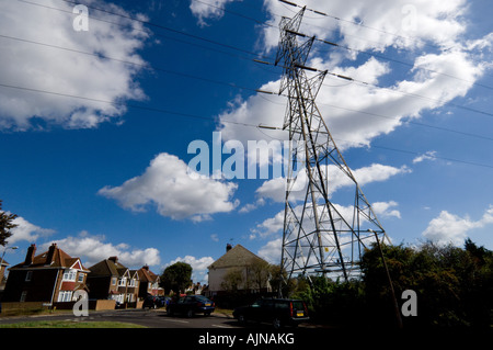 Power lines and a pylon over a house at Oxford Stock Photo - Alamy