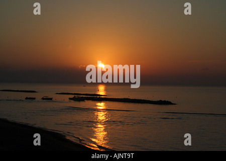 Sunset in the sea, Cyprus Stock Photo - Alamy