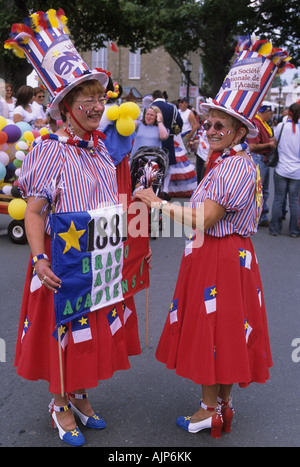 Women dressed in acadian colours at the acadian 'Tintamarre ...
