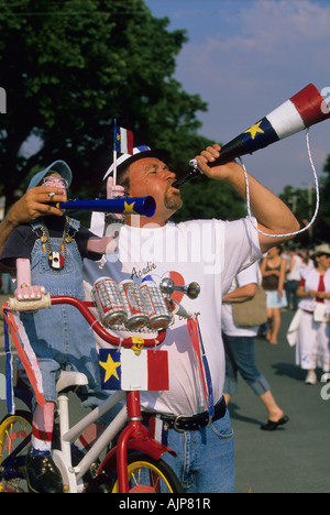 Man blows horn at the acadian 'Tintamarre" celebration in Caraquet, New ...