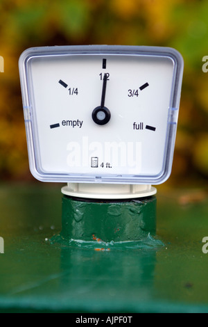 Fuel gauge. Half full tank. Round black car dashboard 3d device Stock ...