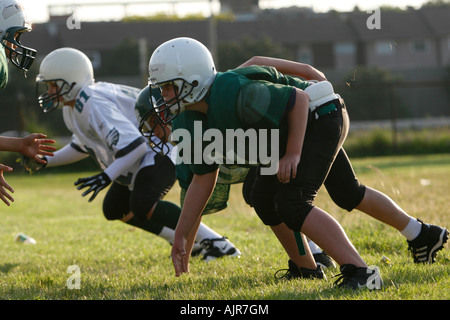 tackel football youth teens playing tackle football during practice in ...