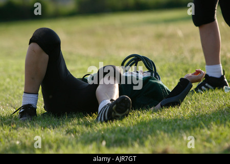 tackel football youth teens playing tackle football during practice in ...