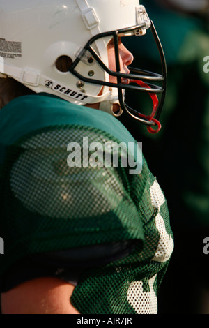 tackel football youth teens playing tackle football during practice in ...