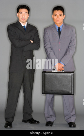 Portrait of two businessmen standing together Stock Photo - Alamy