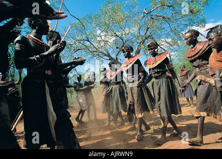 Pokot men jumping high in initiation ceremony dance, Kenya Stock Photo ...
