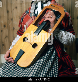 A Crwth an ancient Welsh stringed musical instrument played by a ...