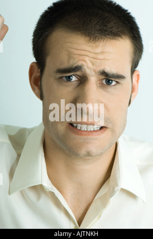 Portrait of angry man gritting teeth in business suit, frustrated and ...